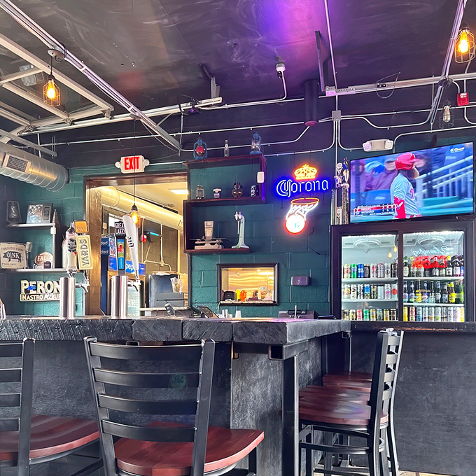 The interior's exposed ductwork and pendant lighting create an atmosphere that says, "Yes, we're serious about our food, but we don't take ourselves too seriously."