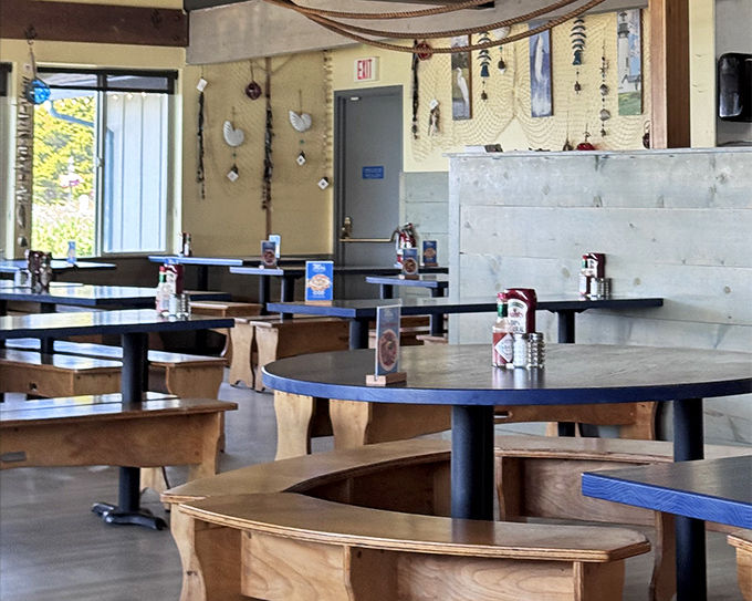 The dining area's unpretentious charm lets you focus on what matters: the food, the company, and those spectacular bay views just outside.