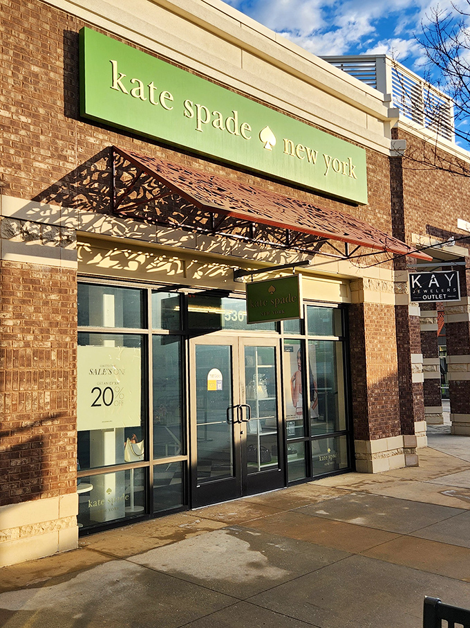 Kate Spade's distinctive green signage and architectural awning bring New York sophistication to the heart of Mississippi.