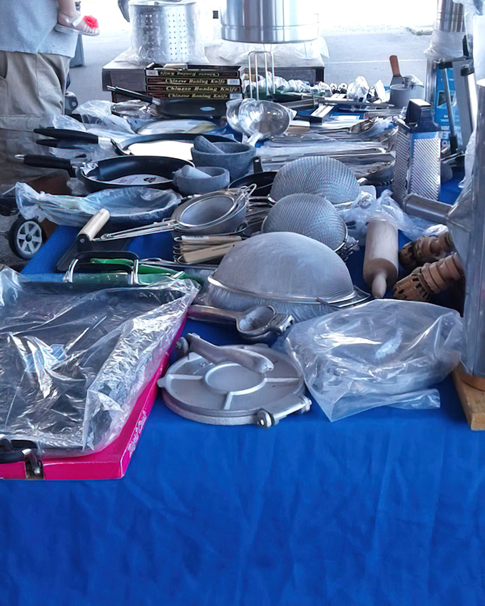 Kitchen tools with history baked right in. That colander probably strained more pasta than an Italian grandmother on Sunday.