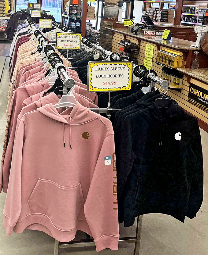 Pink meets practicality in the hoodie aisle. The unofficial uniform of comfort seekers everywhere, displayed with small-town pricing pride.