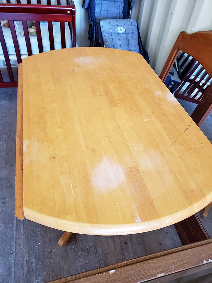 A solid wood dining table that's probably hosted thousands of family meals&mdash;just imagine the conversations it could share if tables could talk.