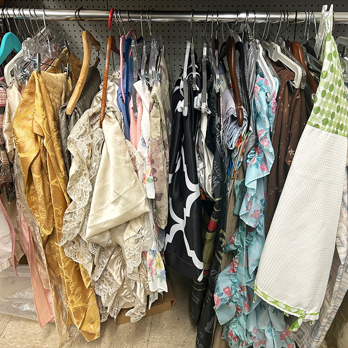 Fabric treasures hanging in patient anticipation of their next life. Yesterday's tablecloth becomes tomorrow's craft project or vintage-inspired outfit.