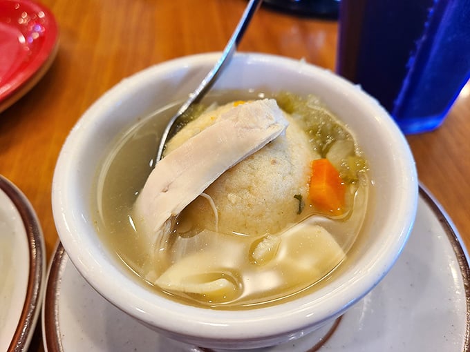 Matzo ball soup that could heal whatever ails you. That perfect dumpling floating in golden broth is chicken soup for the Alabama soul.