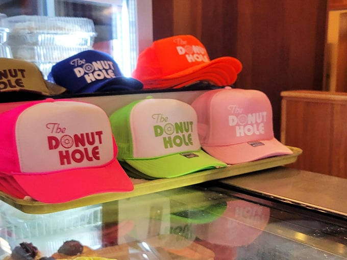 Colorful caps that say "I've conquered the Donut Hole" more effectively than any social media post ever could.