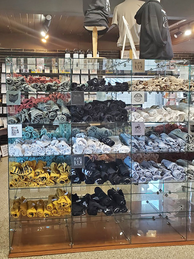 Not a food display but a colorful collection of what appears to be rolled textiles or merchandise. Even the shopping in Amish Country is neatly organized!