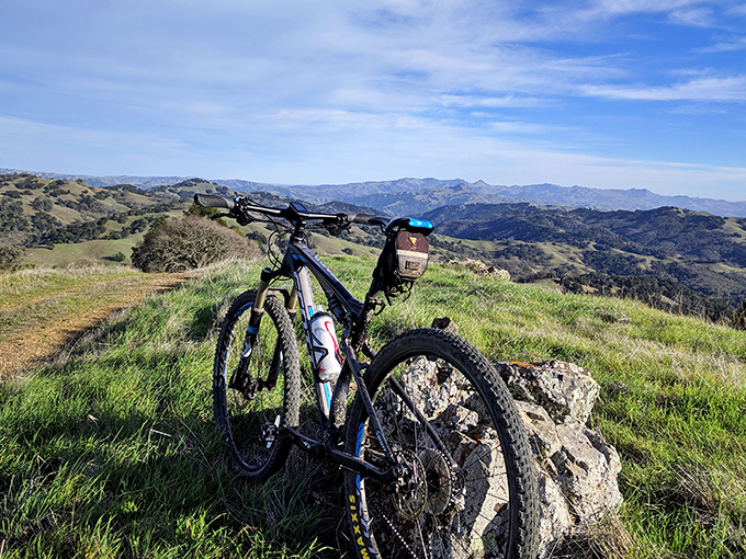 The ultimate office with a view. This mountain bike takes a well-deserved break while its rider contemplates the vastness of California's wilderness.