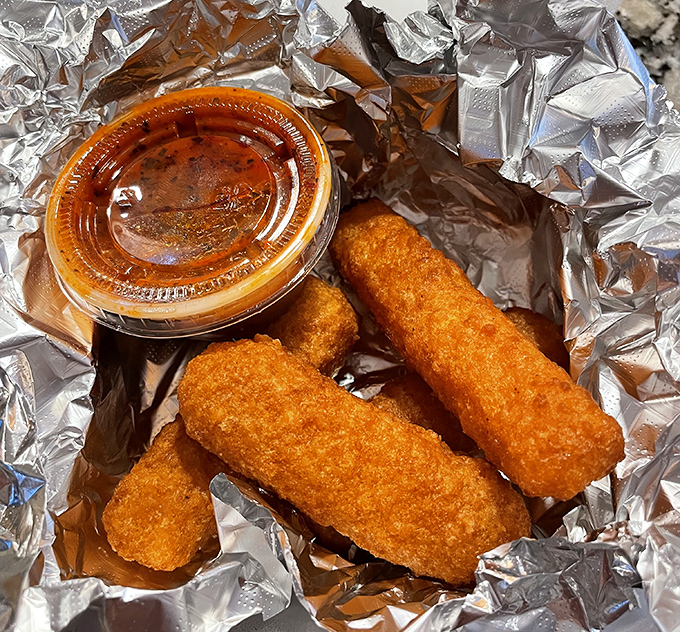 Mozzarella sticks: the universal language of appetizer love, speaking volumes about this kitchen's understanding of what makes people happy.