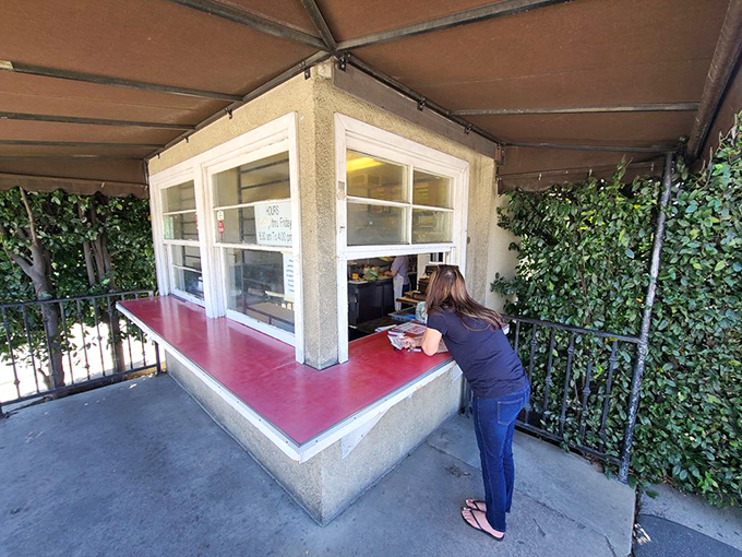 The ordering window &ndash; where dreams come true and diet plans go to die. Worth every delicious calorie.