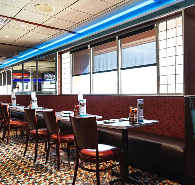 Multicolored tile floors and spacious booths make every seat feel like the best spot in town.