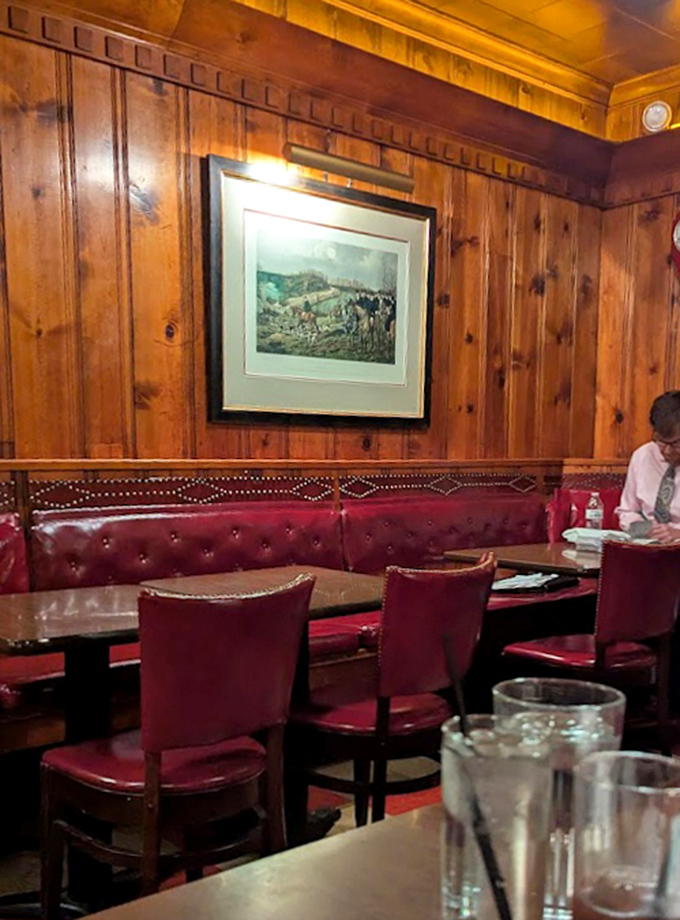 Those red leather booths have cradled more celebrations than a lifetime of New Year's Eves.