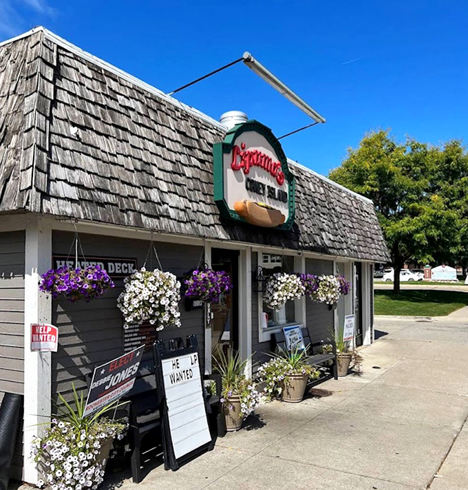 Hanging flower baskets frame the entrance like a welcoming committee. Even the building seems to be saying, "Come on in, we've been expecting you."