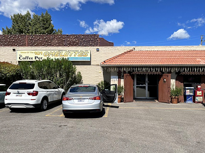 Morning sunshine illuminates the parking lot &ndash; soon to be filled with cars belonging to breakfast pilgrims seeking omelet enlightenment.