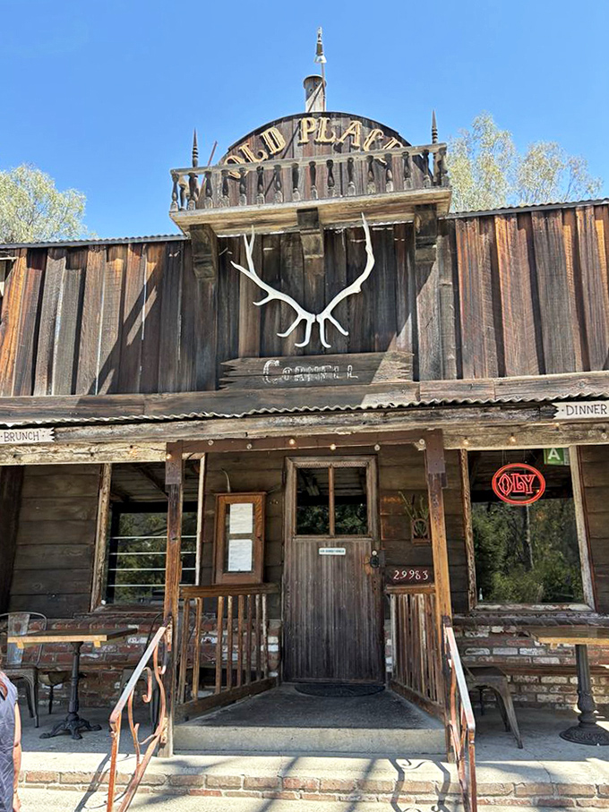The entrance beckons with rustic charm and the promise of culinary adventures&mdash;those antlers aren't just decoration, they're a statement.