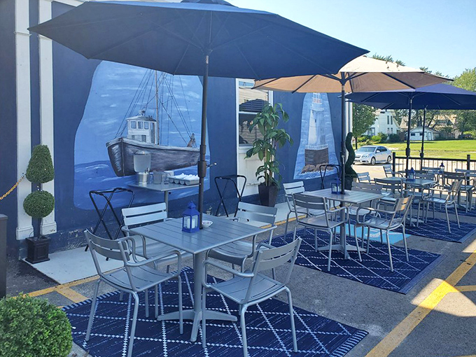 Outdoor patio seating with nautical murals means you can pretend you're dockside while demolishing your dinner.