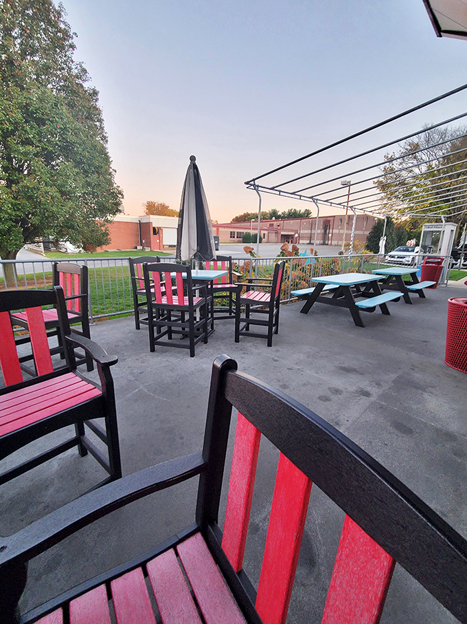 Outdoor seating where memories are made. Those red chairs practically shout "Sit down and stay awhile!" to everyone passing by.