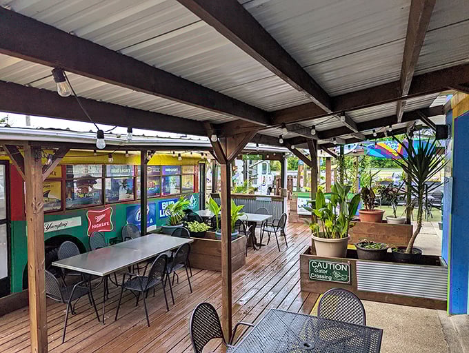 The outdoor seating area offers a breath of fresh air with the same eclectic charm&mdash;string lights, potted plants, and colorful surroundings create an oasis.
