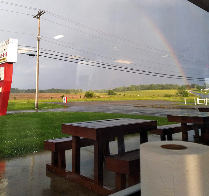 Even after rain, these picnic tables beckon with the promise of outdoor dining beneath Ohio skies&mdash;complete with rainbow approval.