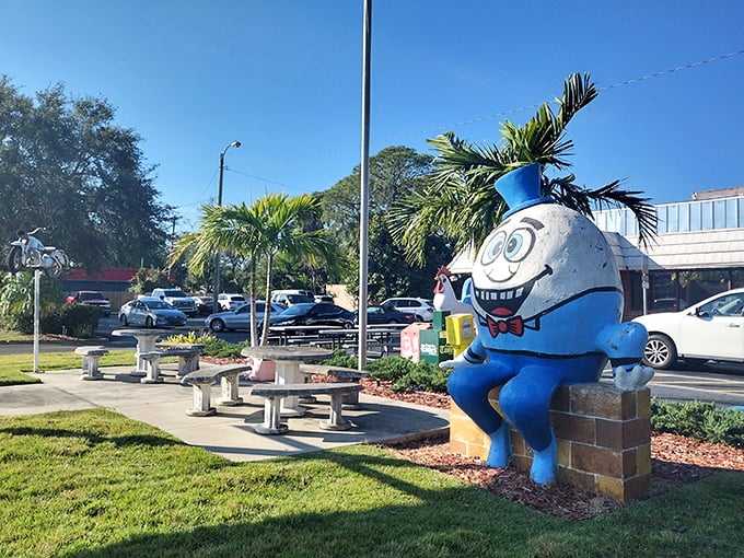 The blue "Humpty Dumpty" statue &ndash; because when your food is this good, even nursery rhyme characters want to hang out.