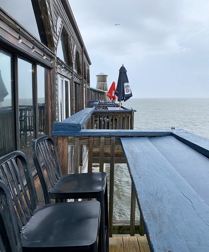 Outdoor seating where the Gulf breeze seasons your meal for free. Worth the wait for these waterfront spots.