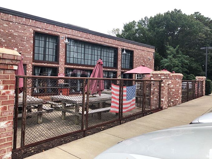 The outdoor patio&mdash;where fresh air meets fresh BBQ. Those umbrellas aren't just for shade; they're protecting precious cargo from the elements.