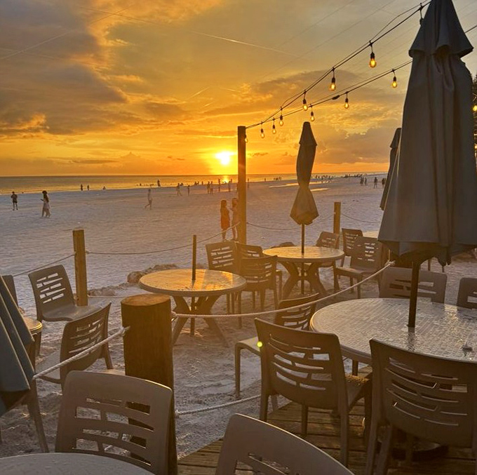Sunset dining with your toes practically in the sand&mdash;the kind of Florida experience that makes northerners question all their life choices.