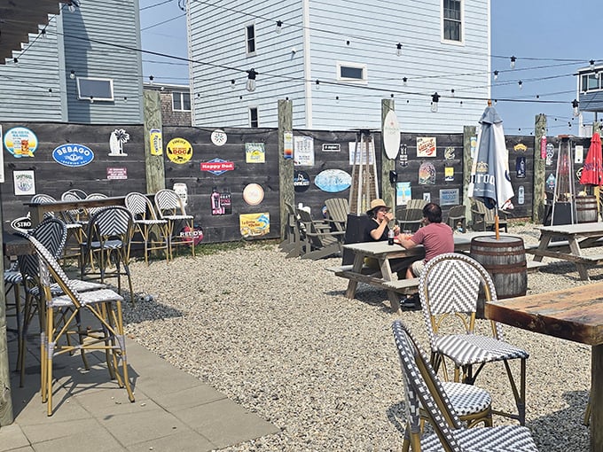 The outdoor patio's weathered wood and beer signs create that perfect "I'm really on vacation now" atmosphere that no designer could replicate.