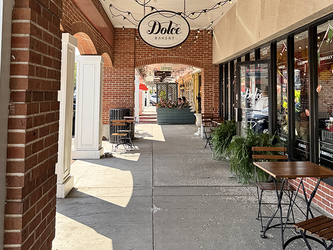 The covered walkway feels like a secret passage to sweetness, with the Dolce sign beckoning like an old friend.