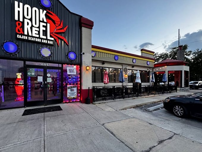 As dusk falls, Hook & Reel's illuminated exterior becomes a beacon for seafood pilgrims across Kansas.