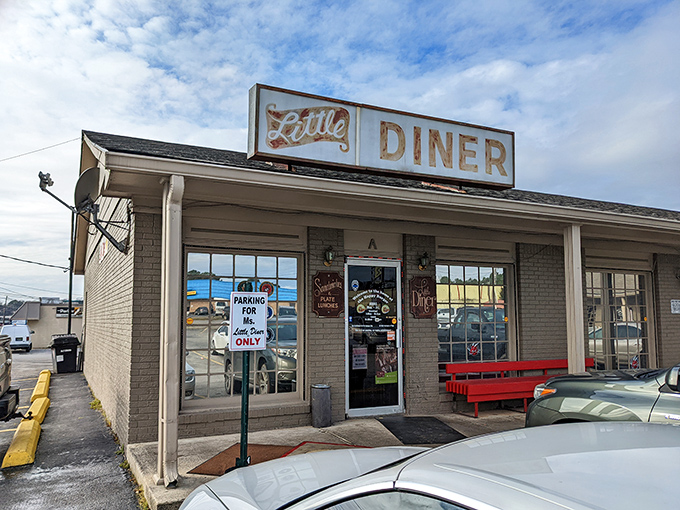 Morning light catches the iconic sign, beckoning hungry travelers like a lighthouse guiding ships to safe, delicious harbor.