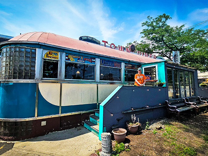 Under blue Massachusetts skies, this vintage diner shines like a chrome-plated promise. Even the building looks delicious.