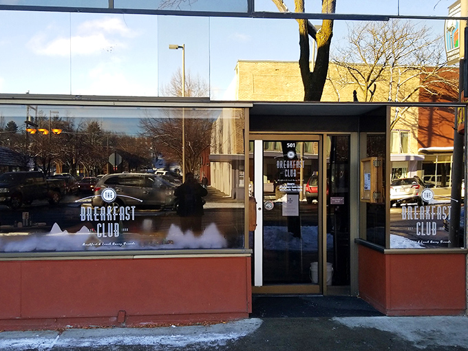 Morning light reflects off the windows of The Breakfast Club, beckoning hungry passersby with promises of coffee and comfort food.