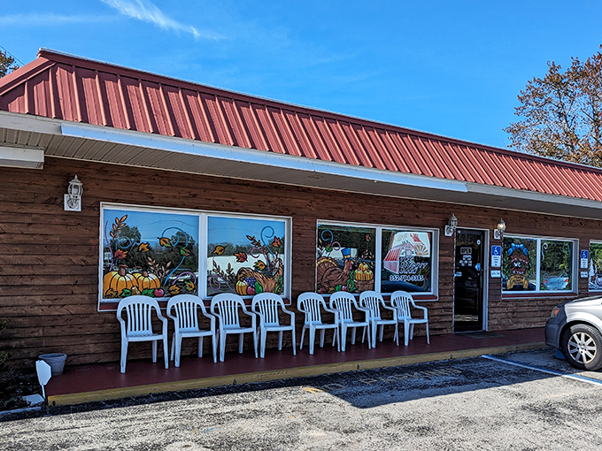 The sign stands like a beacon of hope for hungry travelers: salvation lies within these biscuit-scented walls.
