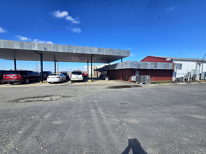 Even the parking lot has that no-nonsense Arkansas charm &ndash; just pull up, park, and prepare for flavor town.