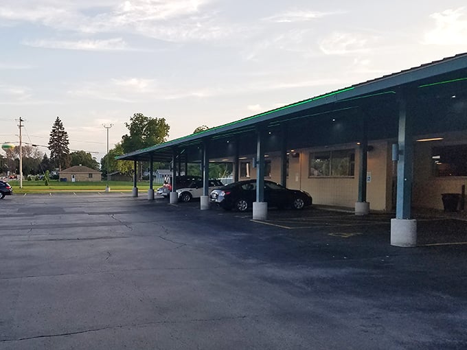 The parking lot where anticipation begins and food comas end. On game days, this asphalt becomes the hottest real estate in Wisconsin.