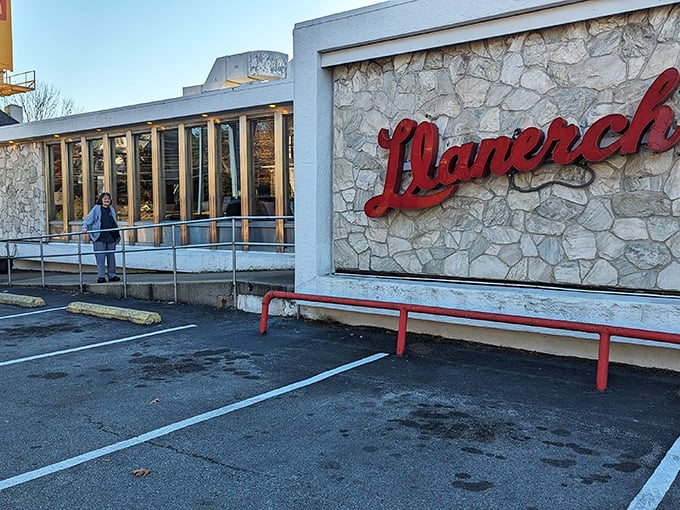The welcoming entrance to Llanerch, where the stone wall and red script logo have greeted hungry Pennsylvanians through changing seasons and decades.