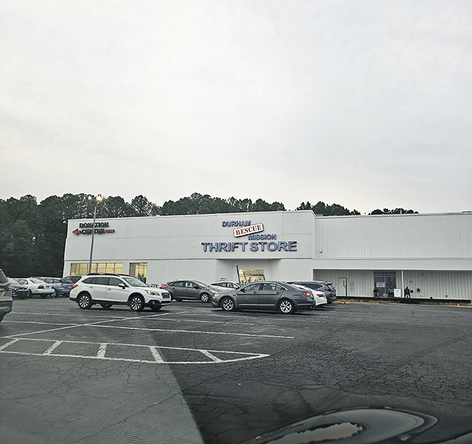 The parking lot offers ample space for treasure hunters, with the store's bold signage promising adventures in secondhand shopping inside.