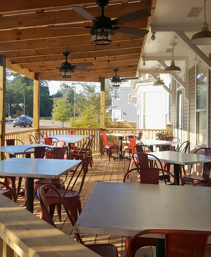 The covered porch offers al fresco dining with ceiling fans &ndash; because enjoying Mississippi cuisine shouldn't require Mississippi perspiration.