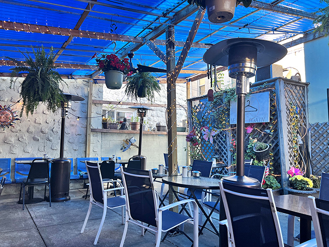 The secret garden patio: where hanging plants and string lights transform morning coffee into a mini vacation. Urban breakfast oasis achieved.