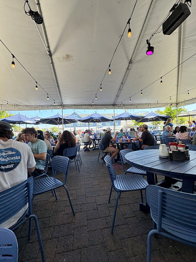 The outdoor patio offers front-row seats to Dewey Beach's passing parade, where people-watching is an Olympic sport.