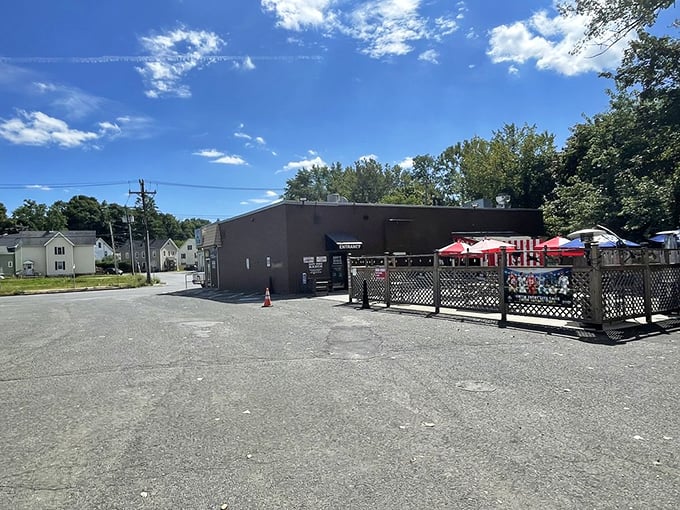 The outdoor space might be simple, but on a perfect New England summer day, those red umbrellas offer shade for hot dog heaven. 