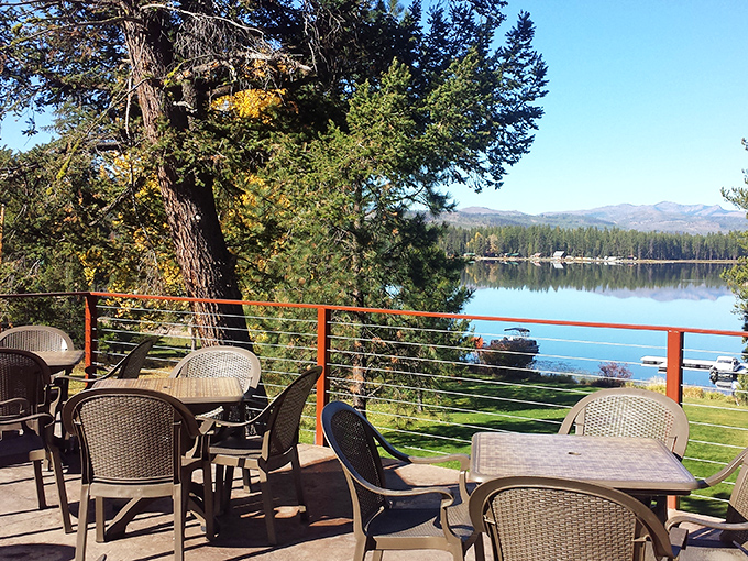 Nature provides the best dining backdrop. Seeley Lake shimmers beyond the patio, offering Montana views that rival even the legendary steaks.
