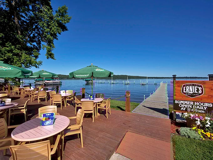 The lakeside patio at Ernie's &ndash; where umbrellas provide shade but nothing obscures that million-dollar Gull Lake view.
