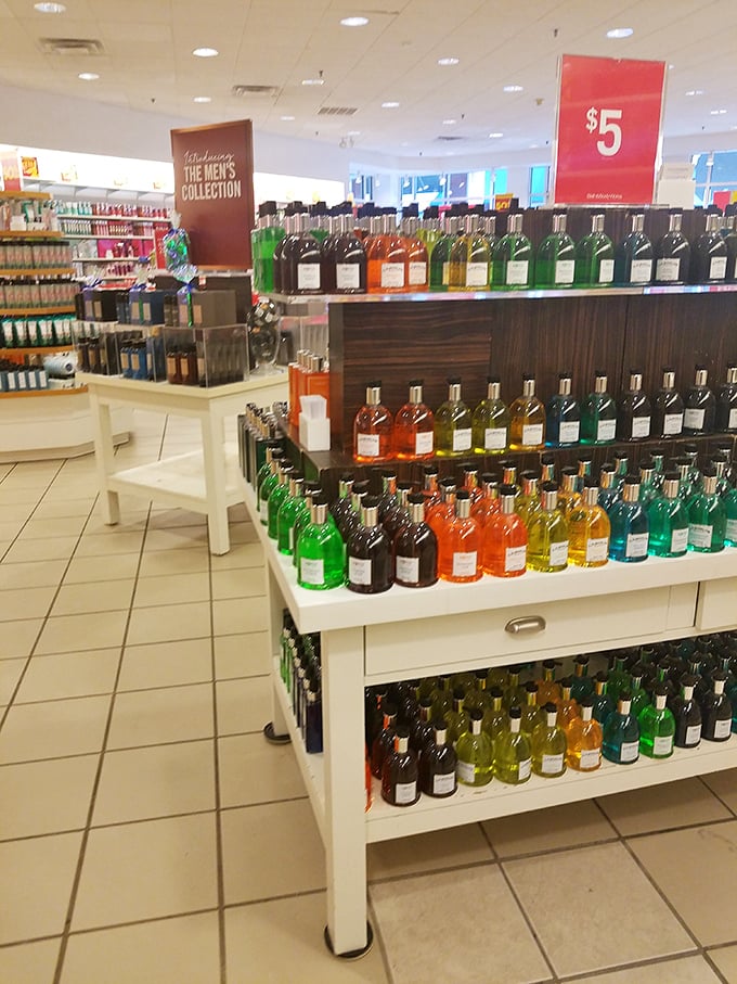 Bath products arranged in a rainbow of scents and colors promise affordable luxury. Bottles of hope that your bathroom could smell like a spa instead of reality.