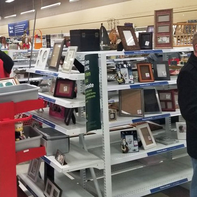 Picture frames wait patiently to house new memories. That ornate wooden one in the middle is practically begging for a family portrait.