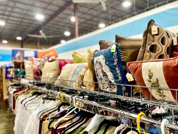 Pillows and linens stacked high, ready to transform your bedroom into a budget-friendly sanctuary.