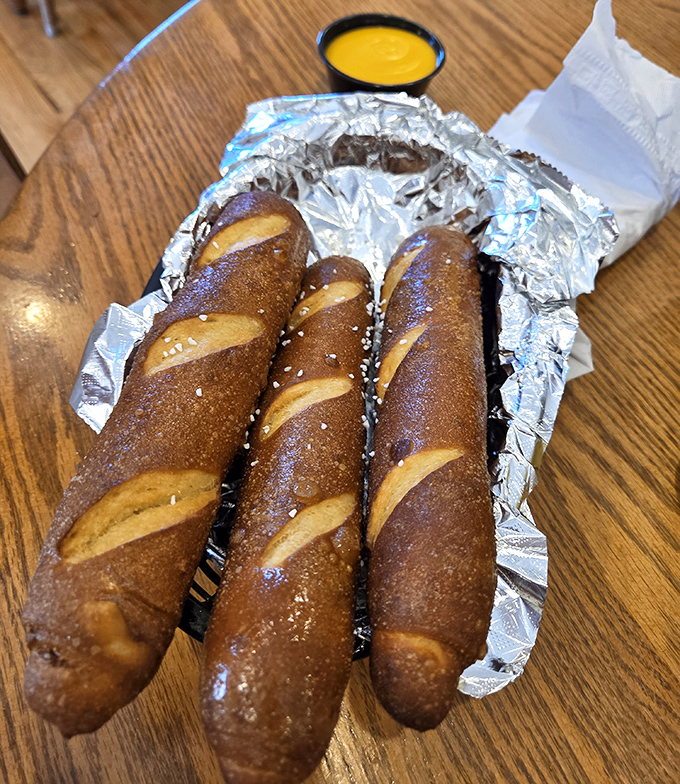 Pretzel sticks with the perfect balance of salt and chew. Dipping sauce not optional—it's a moral imperative.