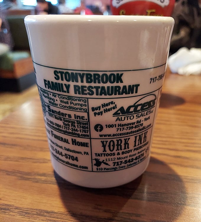 A coffee mug that doubles as local advertising&mdash;the quintessential small-town touch that reminds you exactly where you are.