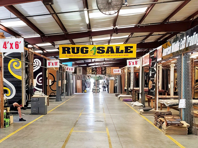 The rug section: where floor coverings hang like tapestries in a museum of practical art, and "Persian-inspired" meets "priced to move."