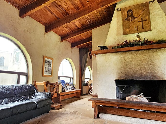 Cozy sitting areas with massive fireplaces provide comfortable spaces for relaxation within these ancient-style stone walls.